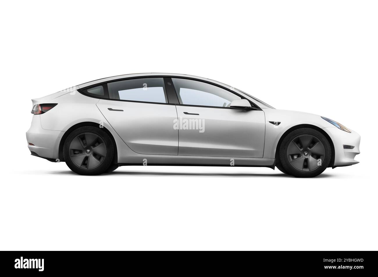 Moscow, Russia - Aug 19 2024: Side view of a white Tesla Model 3 ...