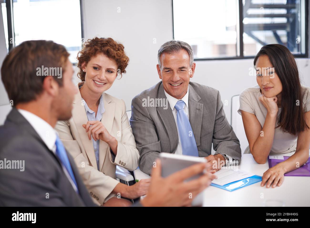 Teamwork, tablet and planning with business people in office for meeting, partnership and ...