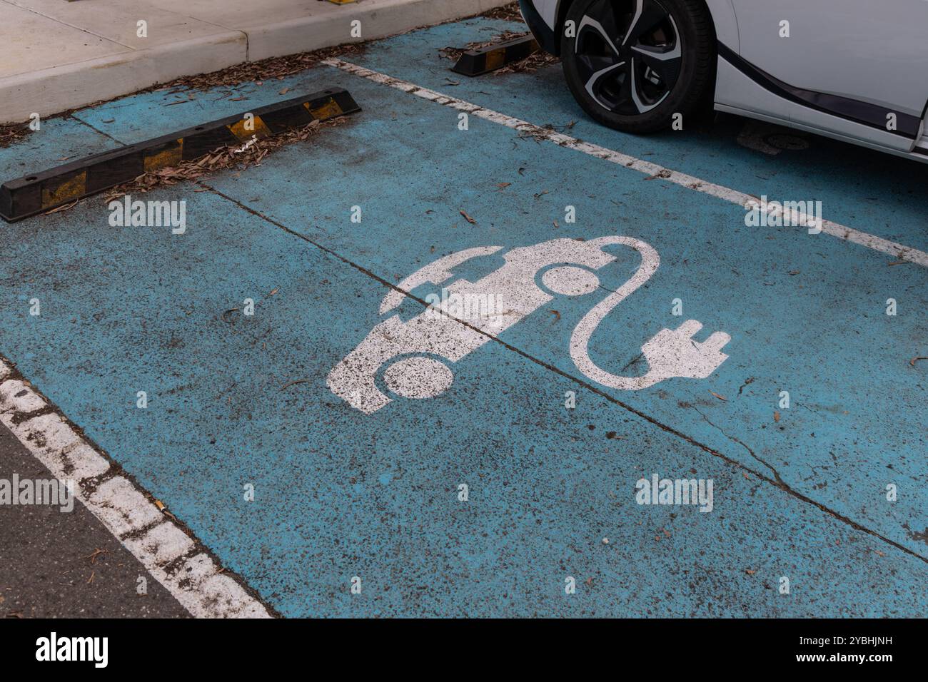 Car park with signage designated for EV cars at charging station Stock ...