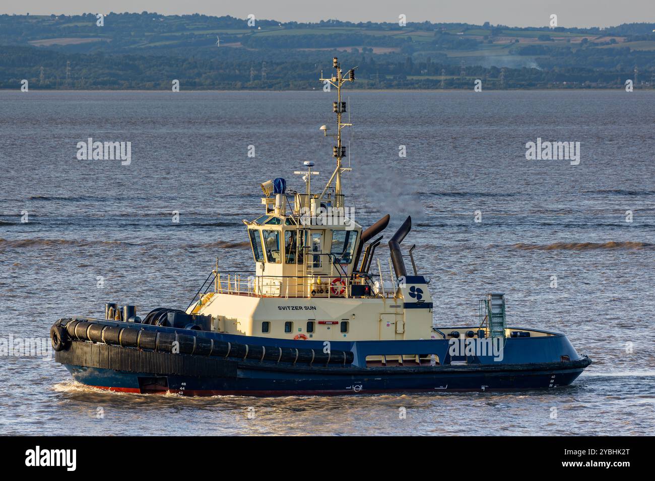 Tug Svitzer Sun heading out to guide tanker into Avonmouth docks Stock ...