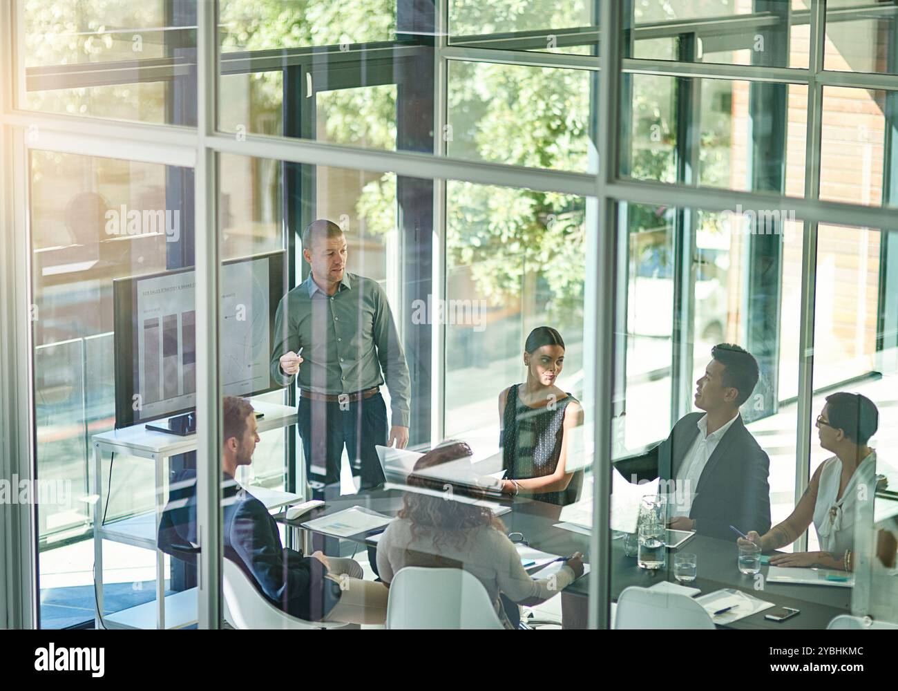 People, boardroom and statistics on screen for presentation, report and ...
