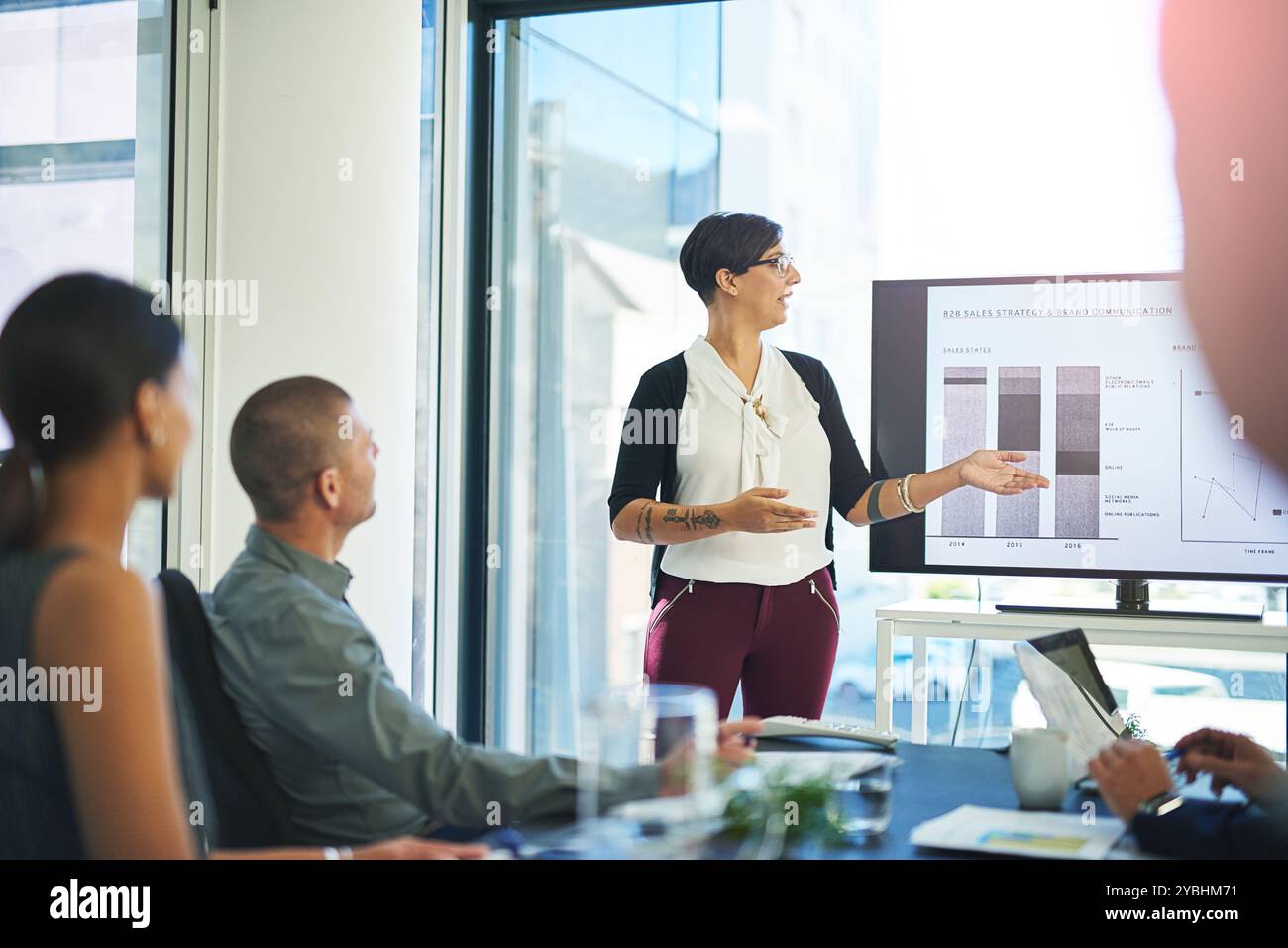 Employees, boardroom and statistics on screen for presentation, report ...