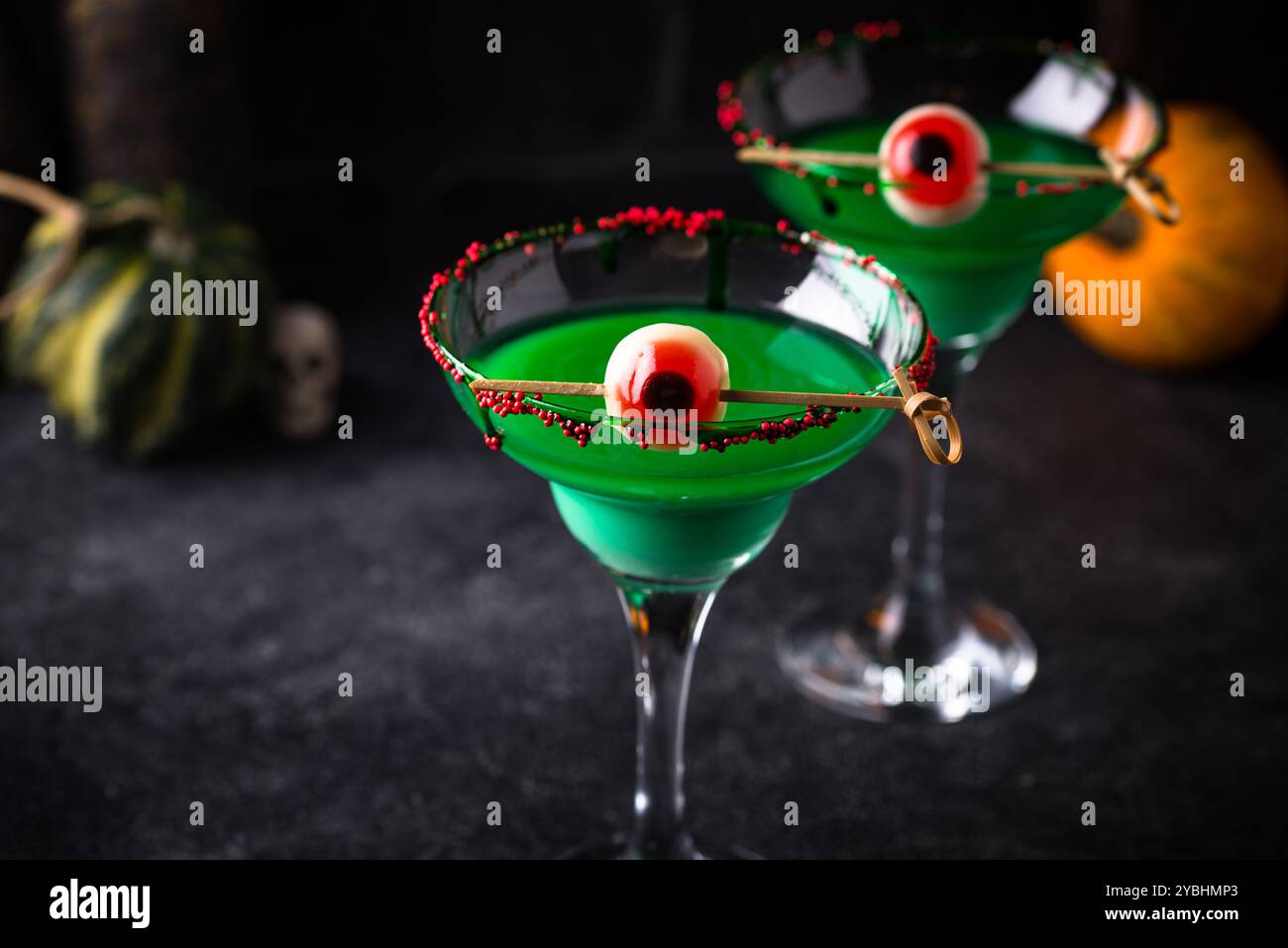 Spooky green halloween cocktail with eyeball Stock Photo - Alamy