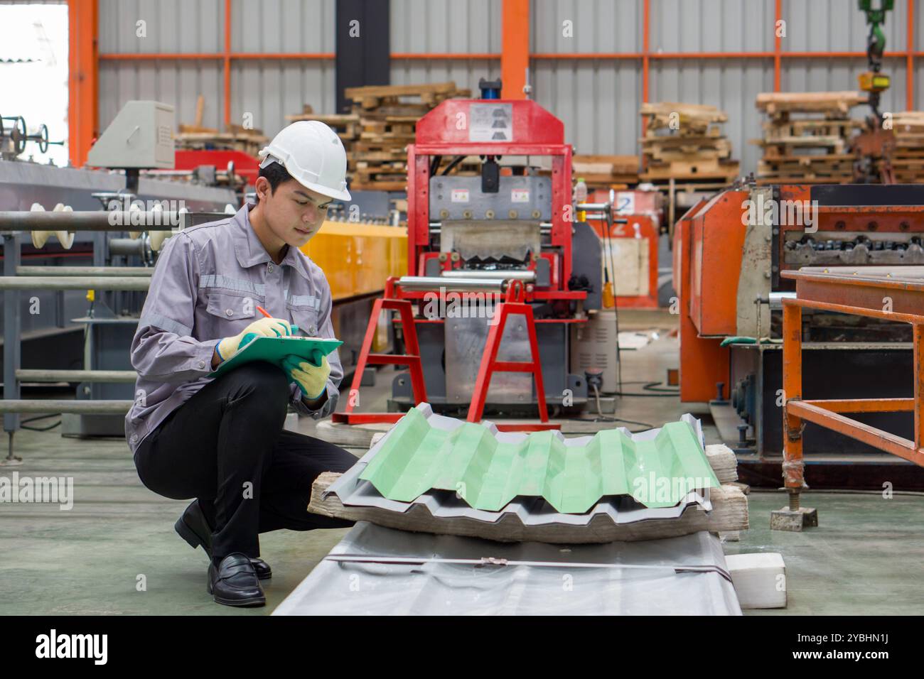 Worker taking tools in machine hi-res stock photography and images - Alamy