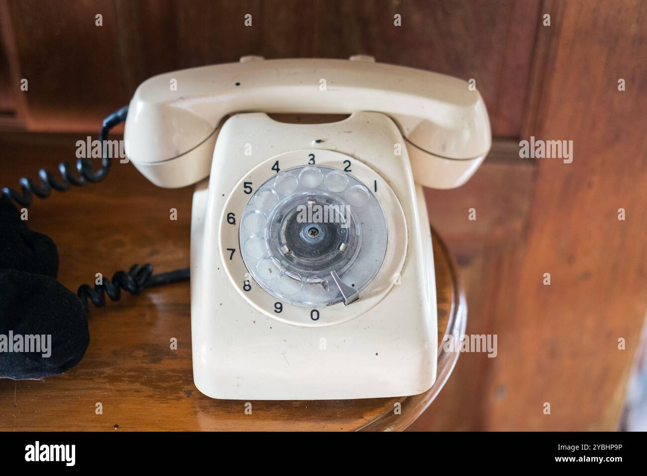 Old telephone on wooden hi-res stock photography and images - Alamy
