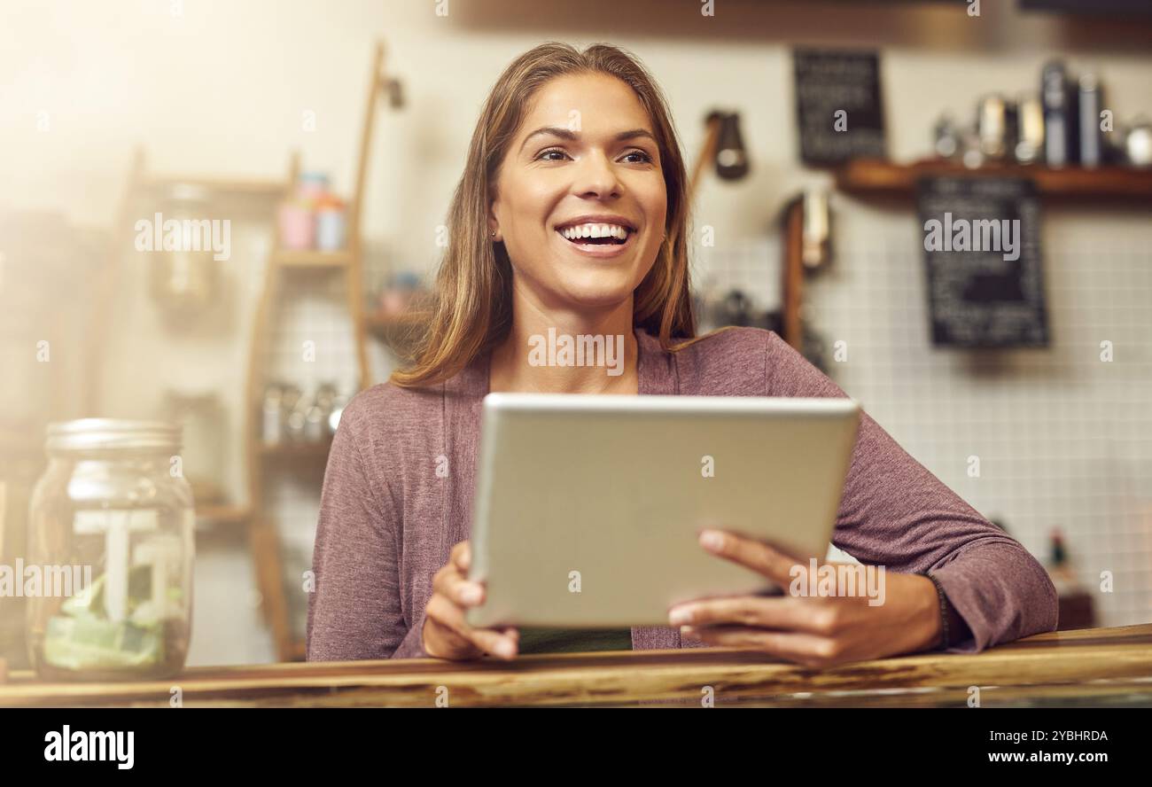 Business owner, typing and woman in store, tablet and internet with ...