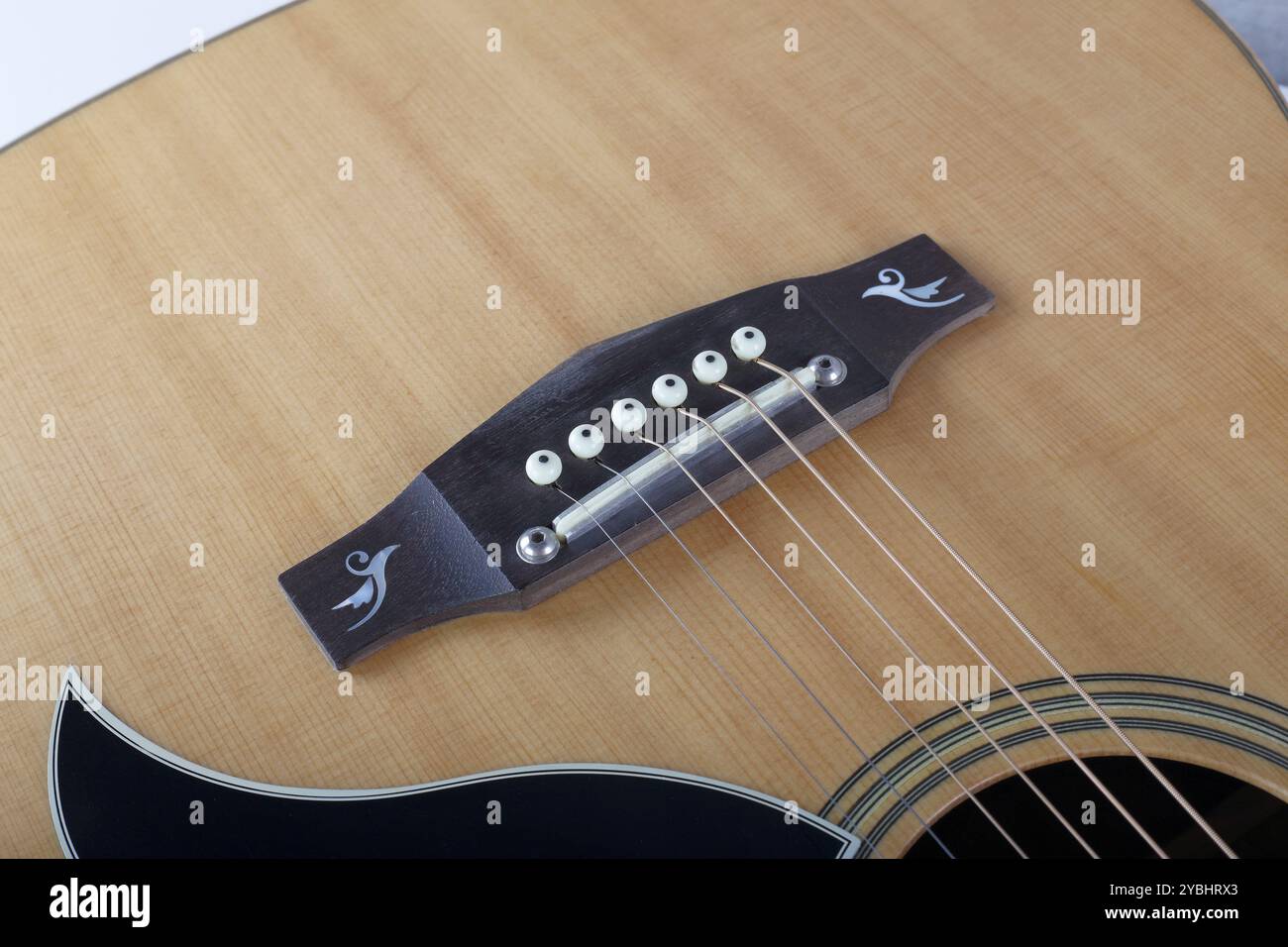 Musical instrument - Fragment western acoustic guitar bridge closeup ...