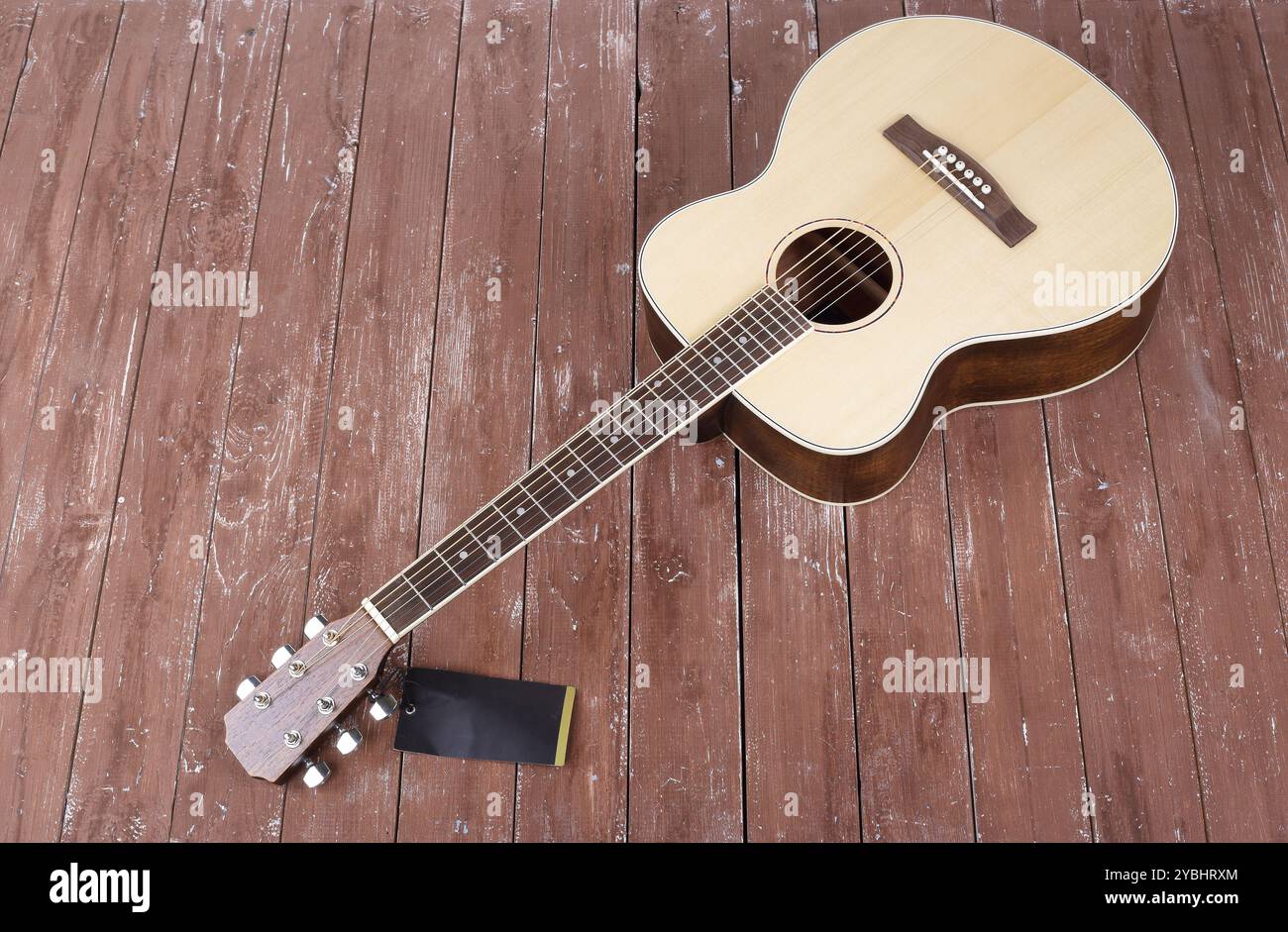 Musical instrument - New solid spruce top acoustic guitar on wooden ...
