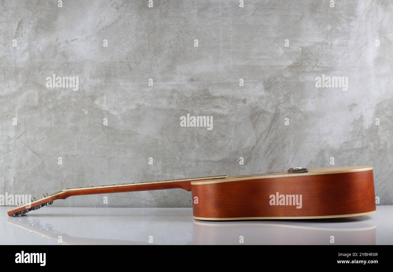 Musical instrument - Side view Western acoustic guitar background of a ...