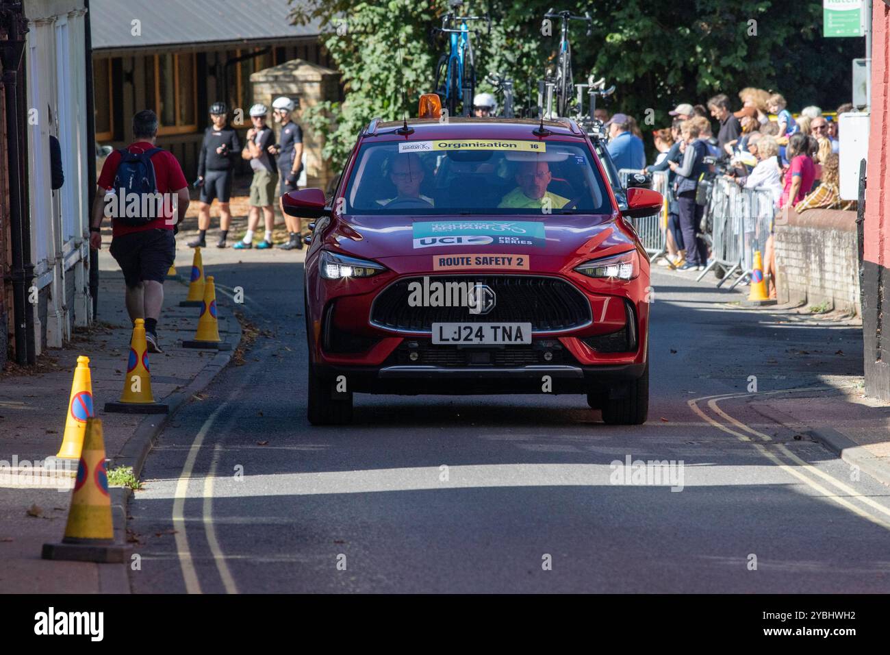 In front of the sixth stage of the 2024 Tour of Britain a red MG SUV ...