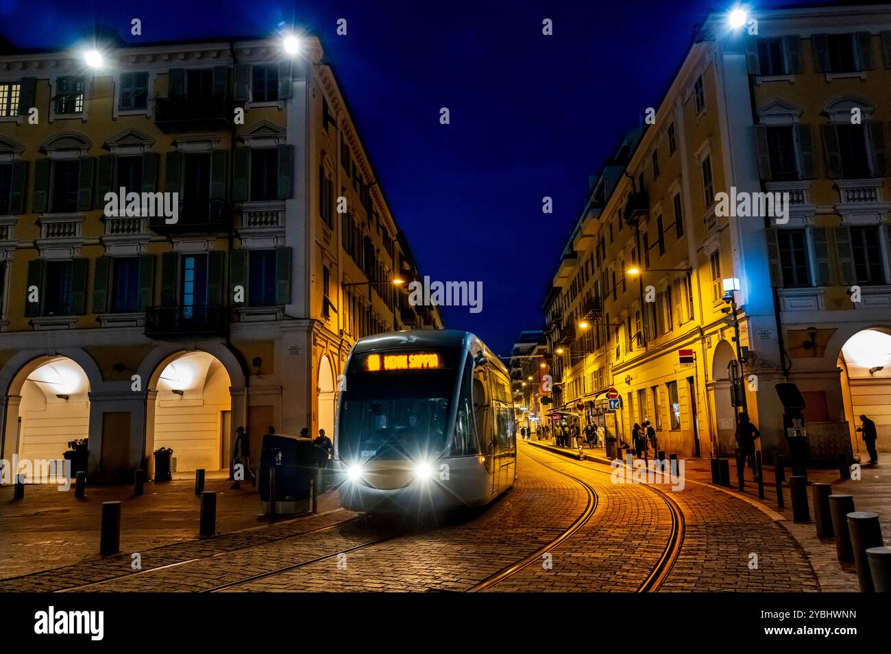 Tram in the Avenue de la République, Nice, France in the evening Stock ...