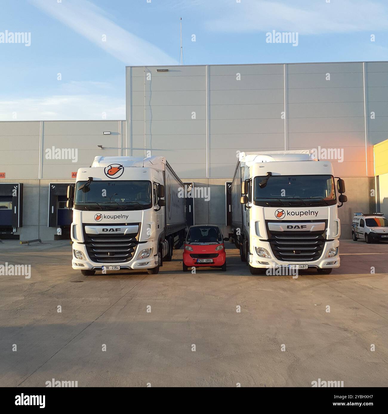 DAF Trucks and Smart Car in a Parking Lot Stock Photo - Alamy