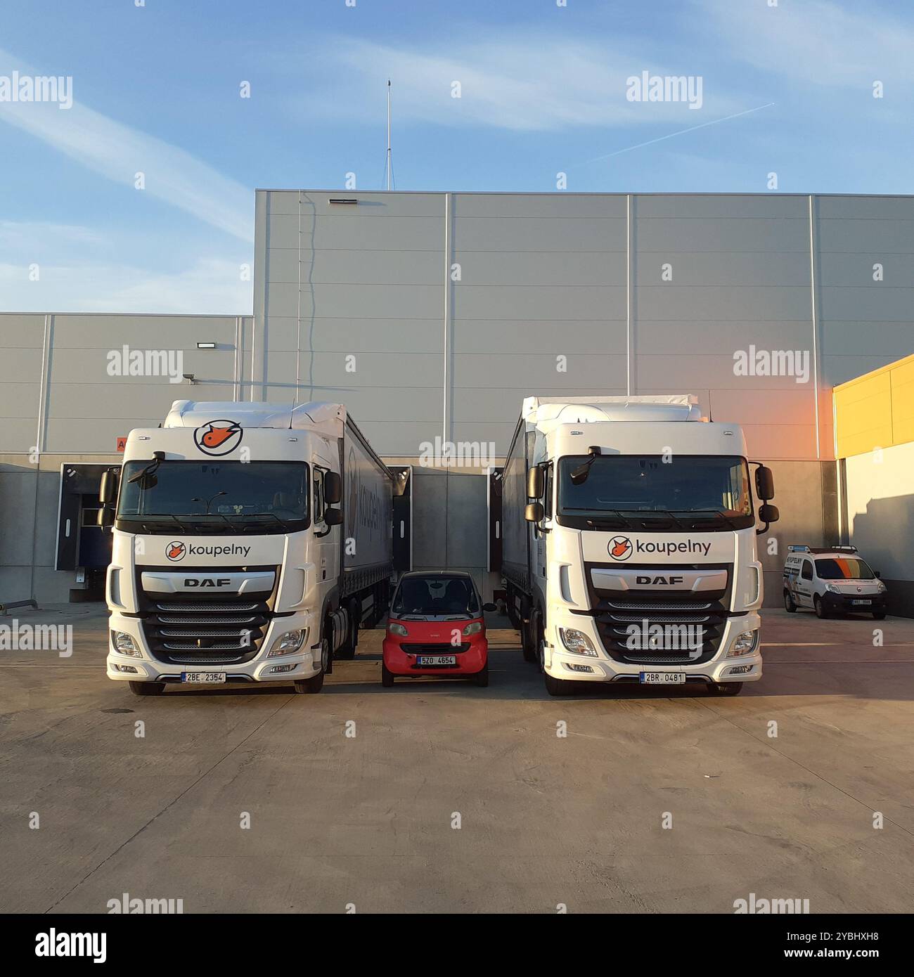 DAF Trucks and Smart Car in a Parking Lot Stock Photo - Alamy