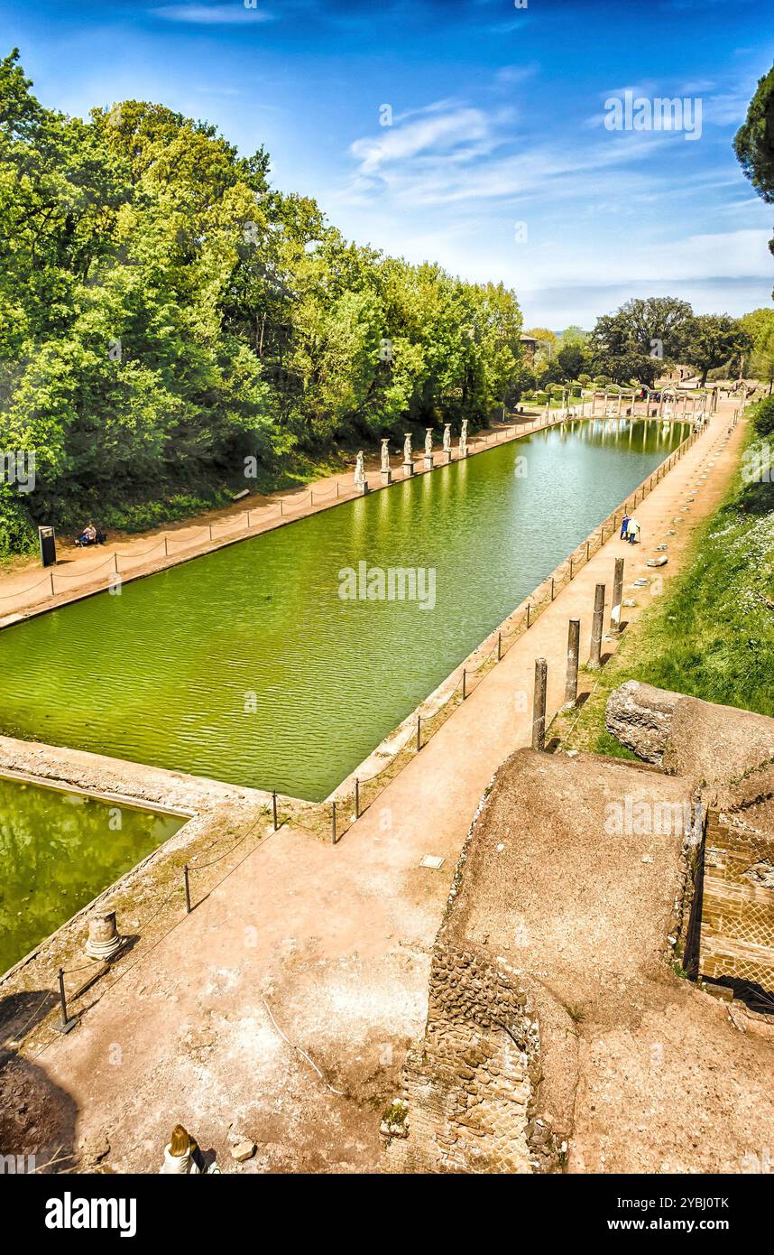 The ancient pool called Canopus, surrounded by greek sculptures in ...