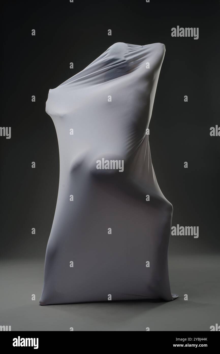 Abstract form draped in fabric creates intriguing shapes in low ...
