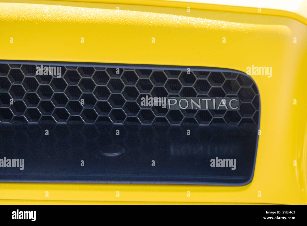 Close up of the iconic pontiac logo adorning the front grille of a ...