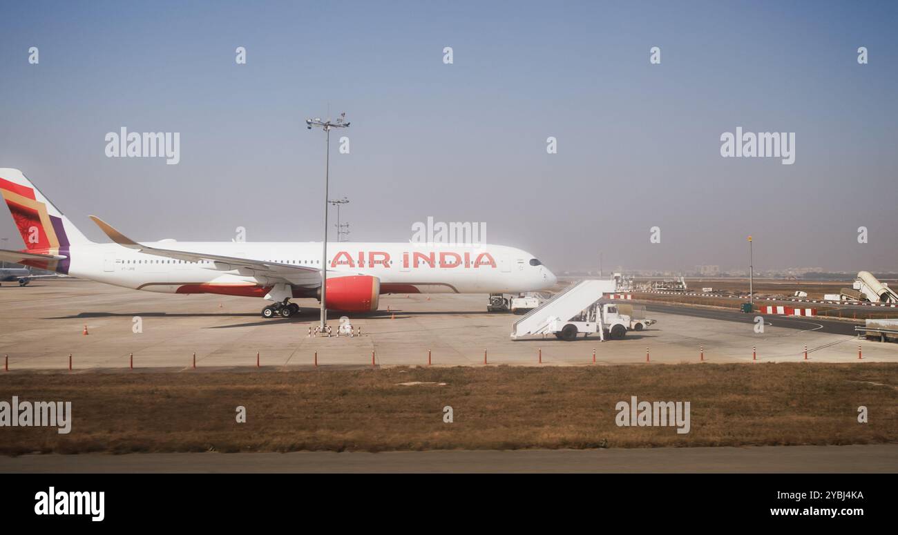 Delhi, India - February. Air India Airlines plane is parked in the ...