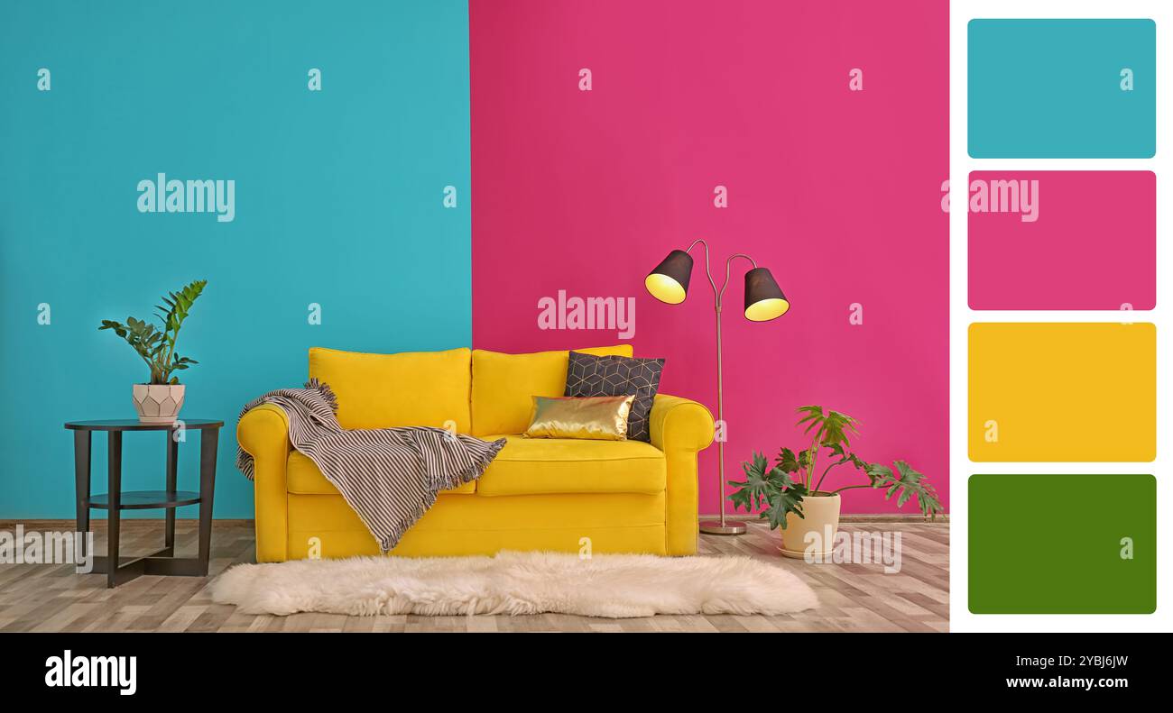 Stylish living room with comfortable sofa near colorful wall. Interior ...