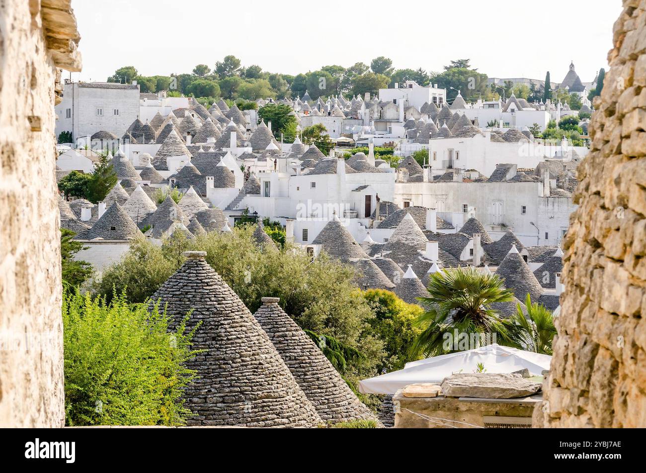Scenic panoramic view of Alberobello town and its typical trulli ...