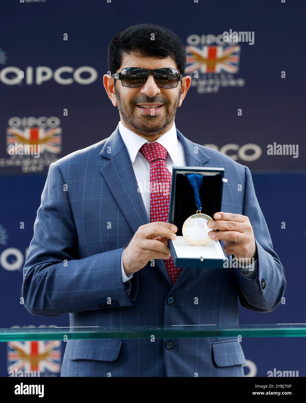 Saeed bin Suroor accepts the medal for Dubai Millennium being induced ...