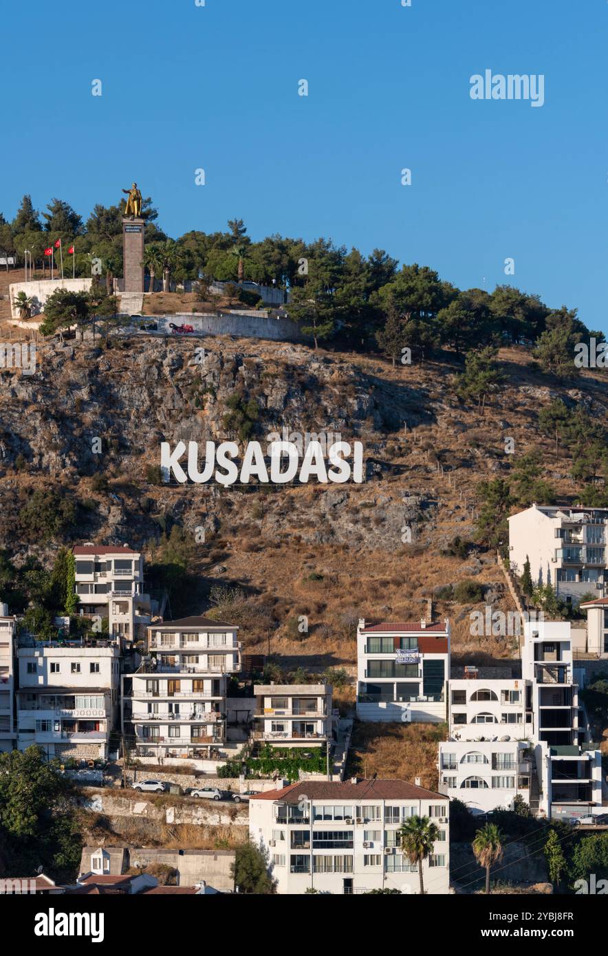 Kusadasi name in large letters over apartment buildings, Kusadasi ...