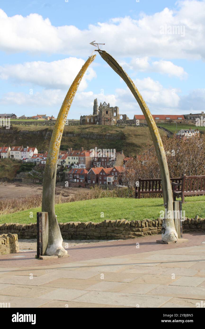Whale Jawbone on display in Whitby, UK. Whitby Abbey can be seen on the ...