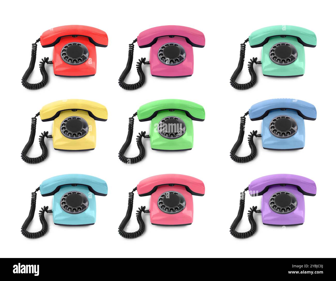 Old telephone with rotary dial of different colors isolated on white ...