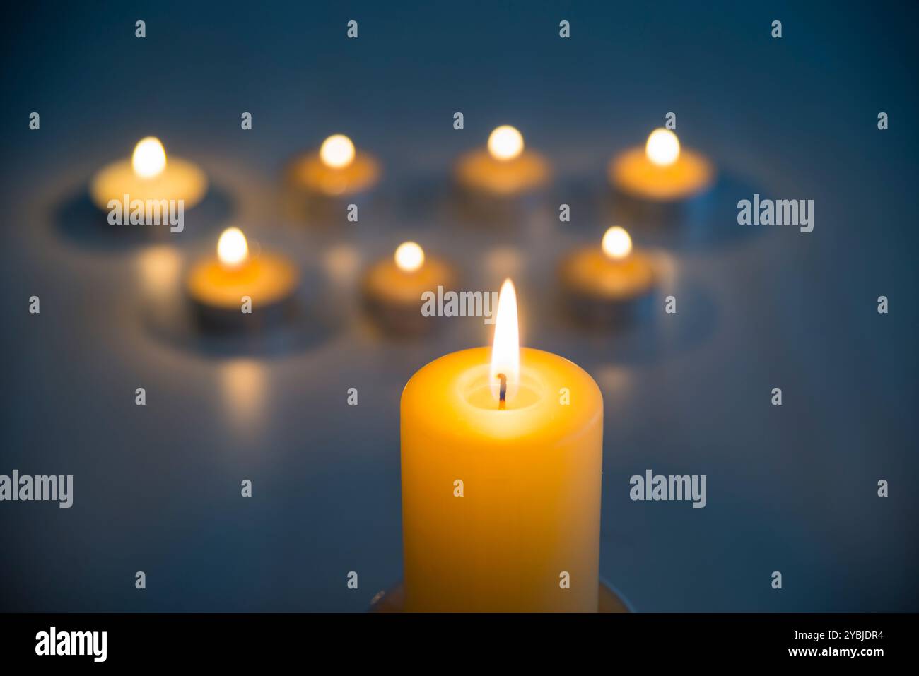 Christian community lit candles hi-res stock photography and images - Alamy