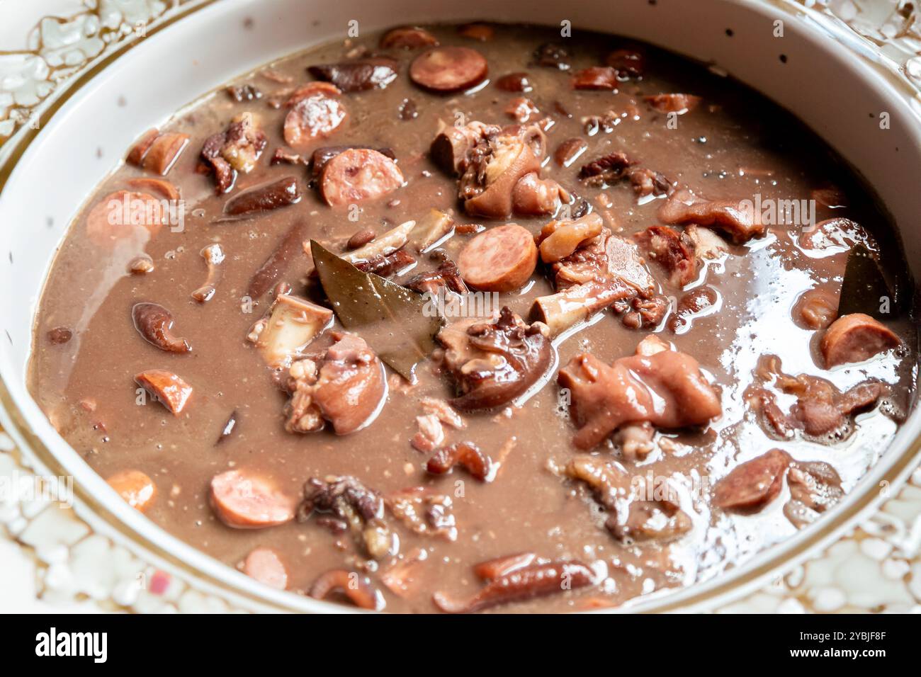 Traditional and true Brazilian feijoada prepared with the most ...