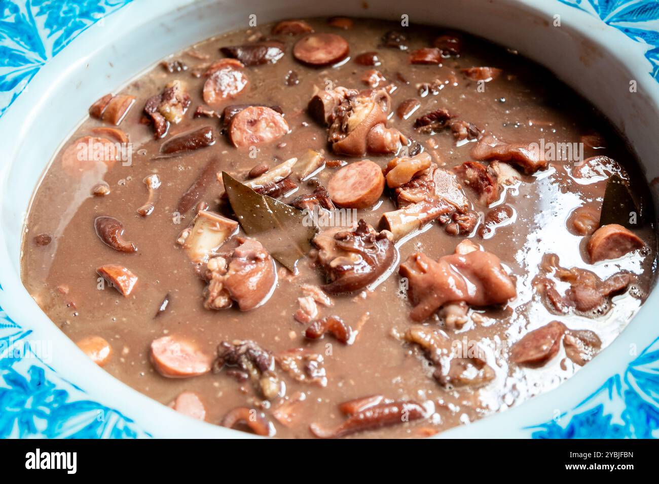 Traditional and true Brazilian feijoada prepared with the most ...
