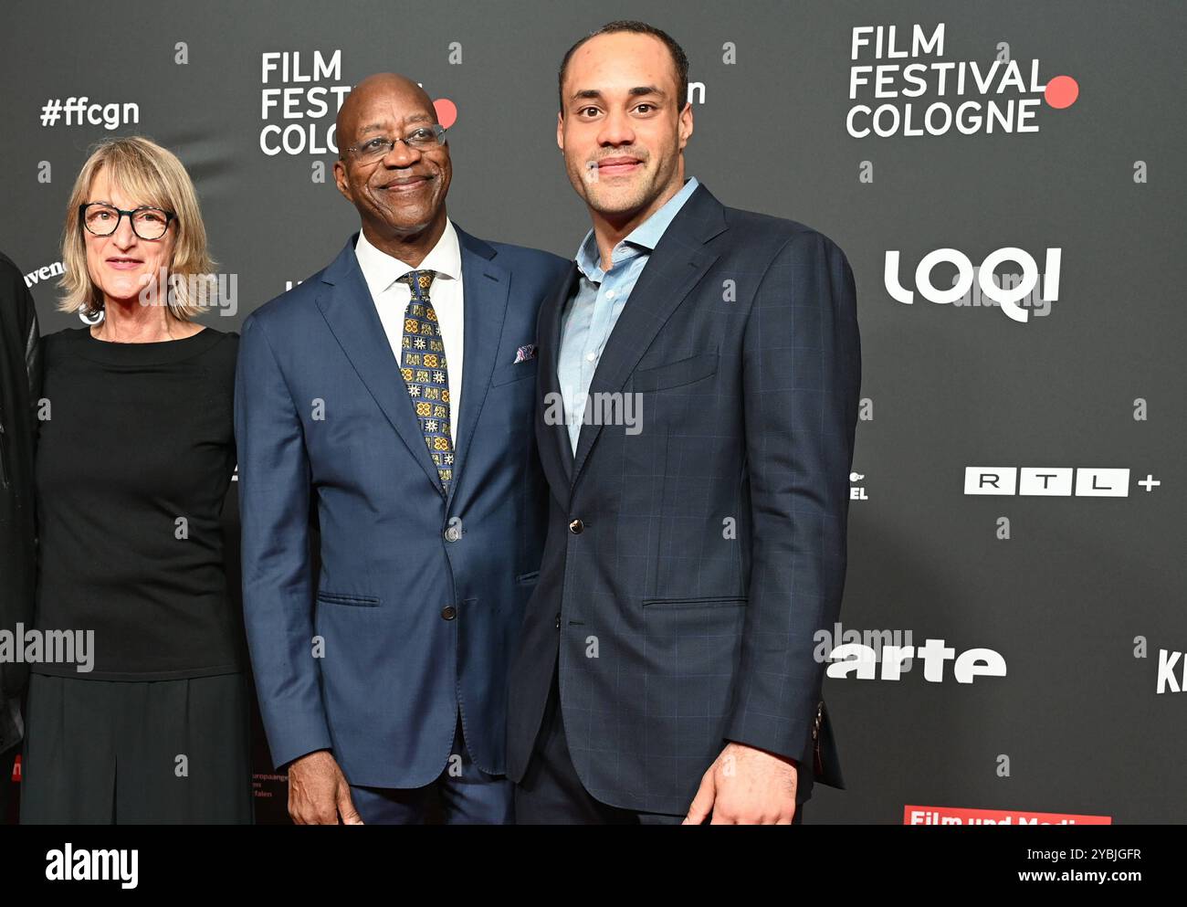 Anne Merrem, der US amerikanische Sportler Edwin Moses und sein Sohn ...