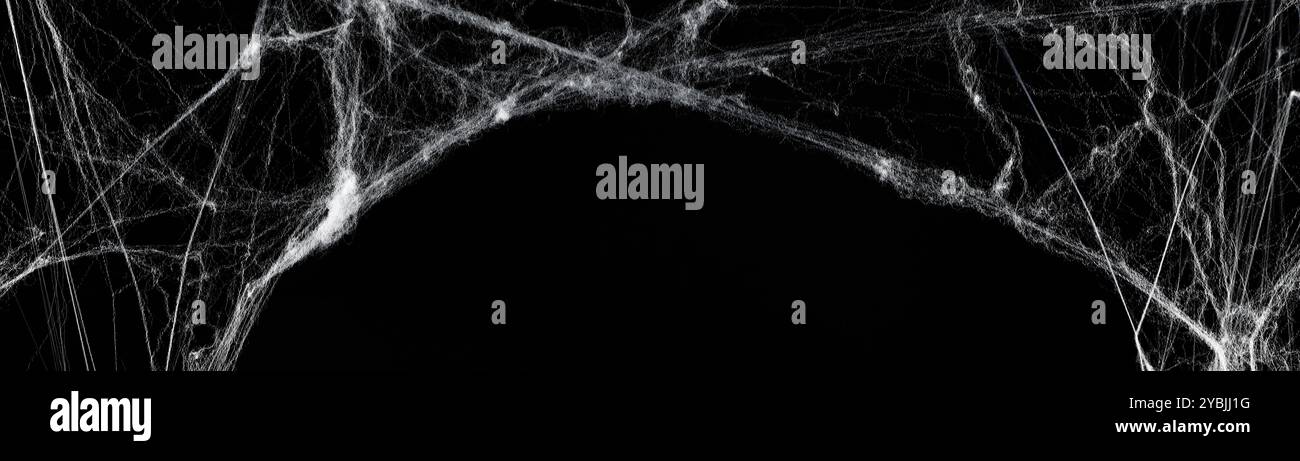 White cobweb on black background, banner design Stock Photo - Alamy