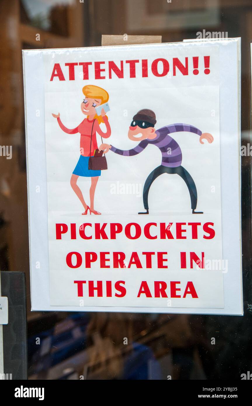 Anti-pickpocket warning sign on Portobello Road. London Stock Photo - Alamy