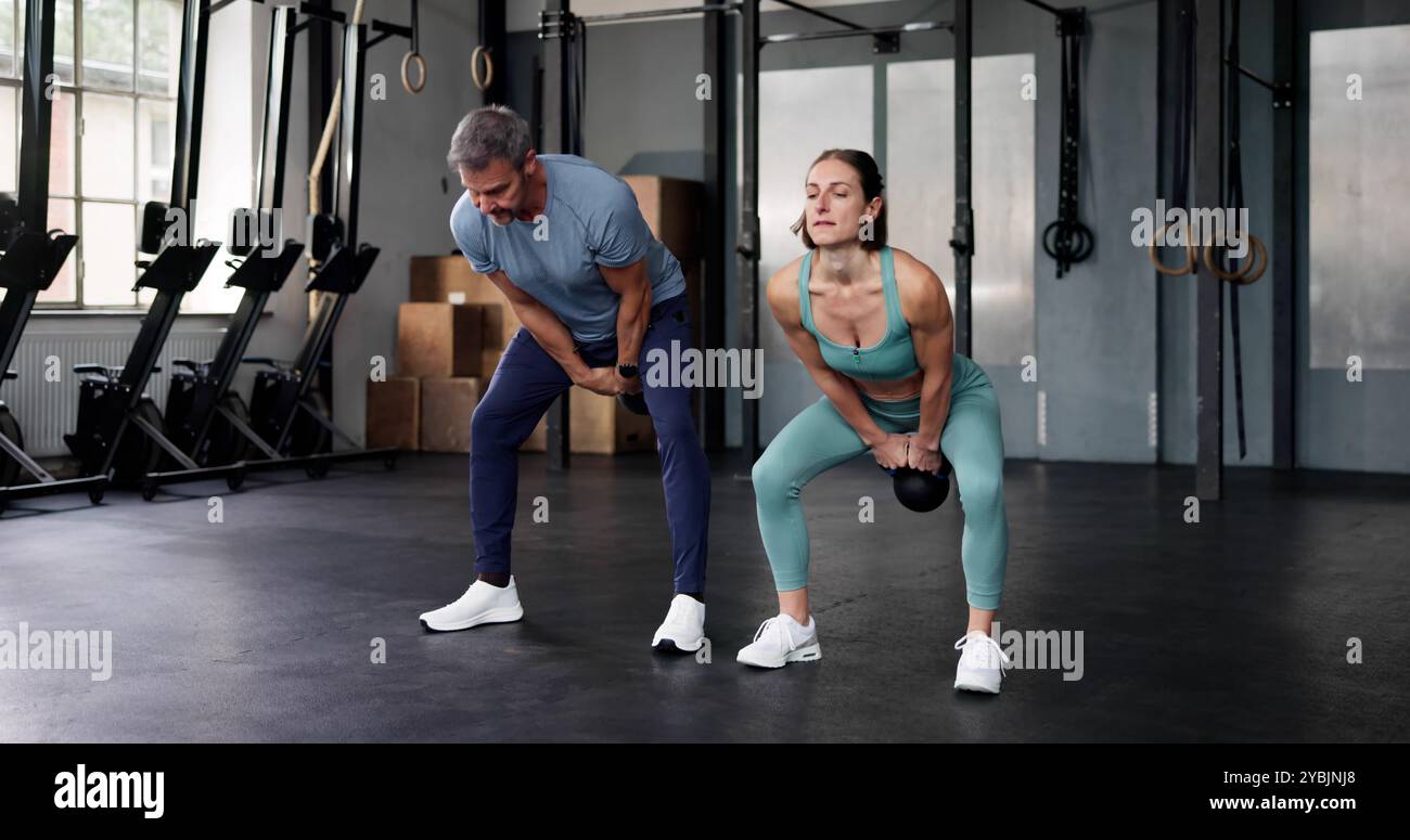 Sport Workout In Gym. Kettlebell Swing. Bodybuilder Athlete Lifting ...