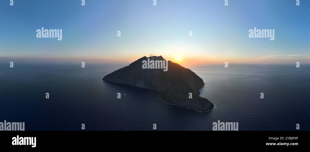 The remote and scenic island of Komba, an active volcano, lies about 70 ...