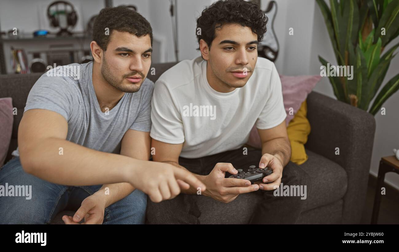 Two friends intensely playing hi-res stock photography and images - Alamy