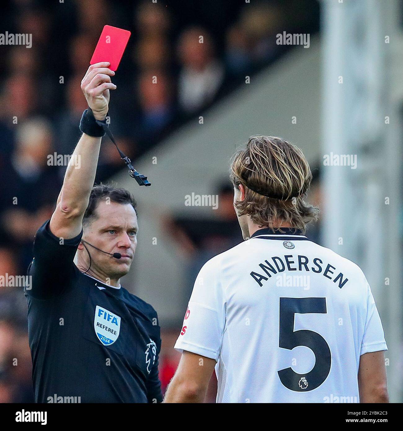 Joachim Andersen of Fulham receives a red card during the Premier ...