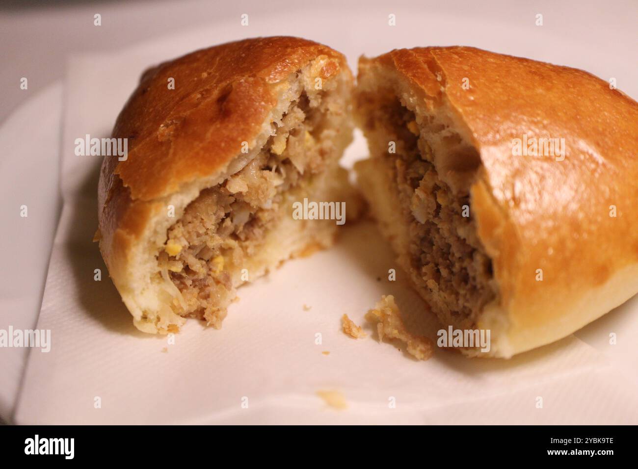 Russian cuisine: pirozhki (baked bun with fillings Stock Photo - Alamy