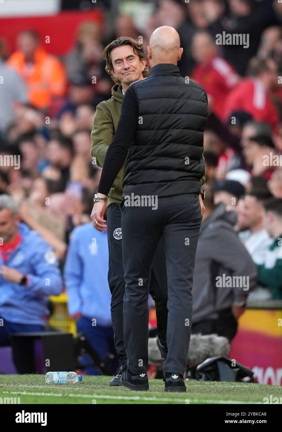 Brentford manager Thomas Frank (left) and Manchester United manager ...