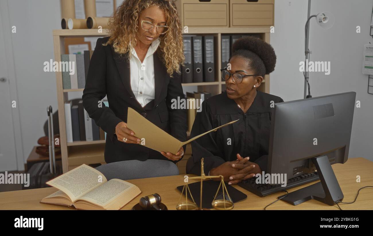 Judge wearing black robe holding hi-res stock photography and images ...