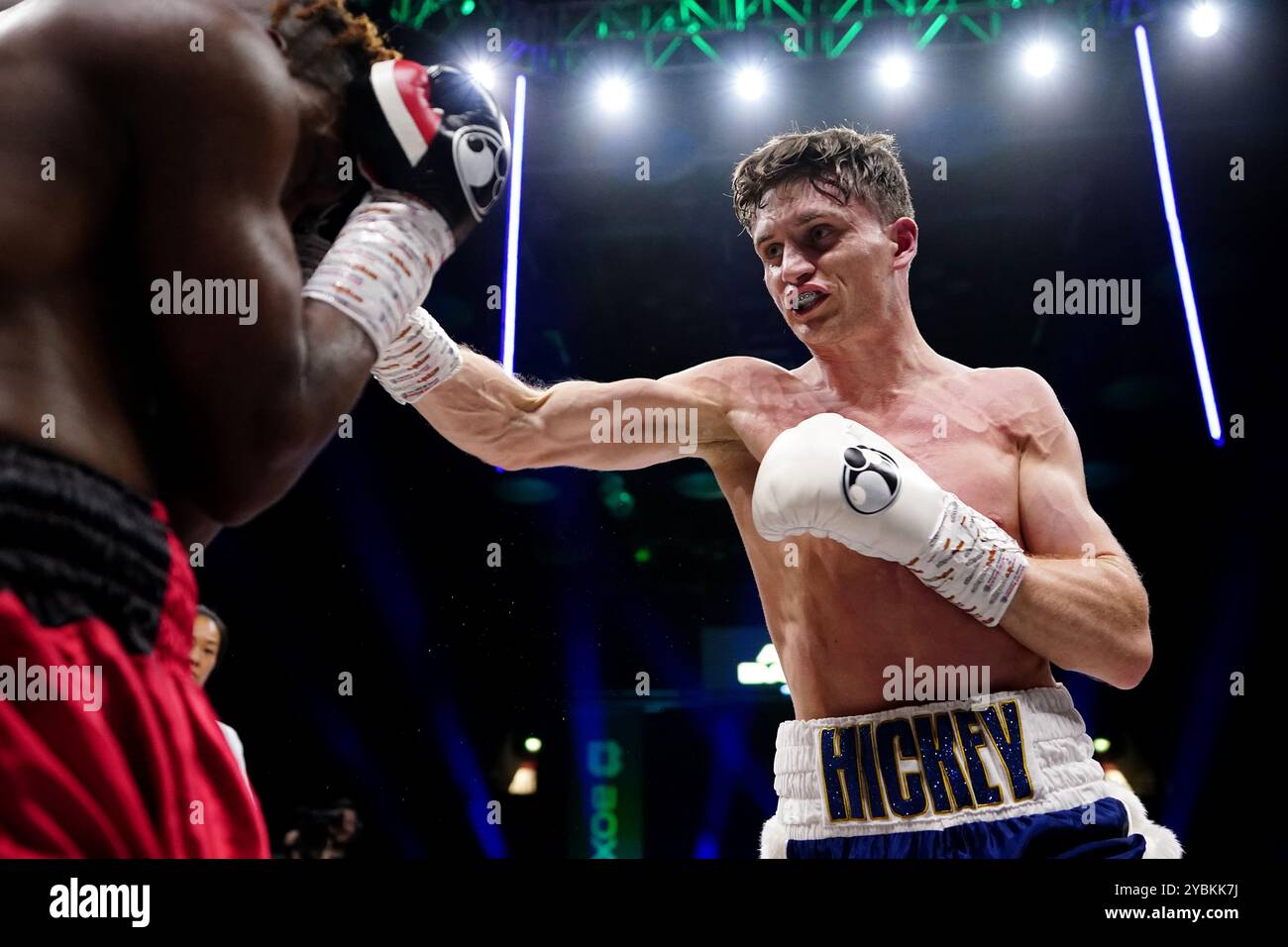 Sam Hickey (right) lands a punch on John Henry Mosquera (left) during ...