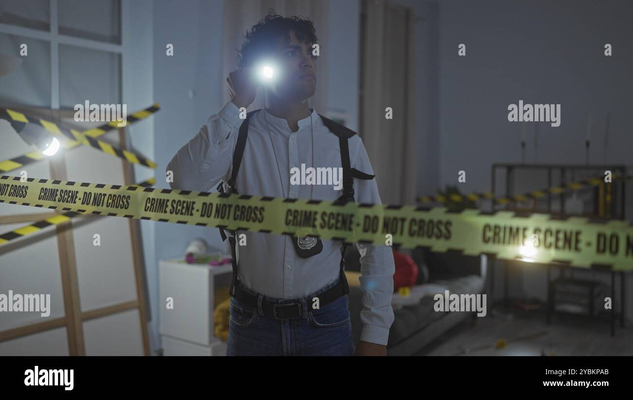 Hispanic man in uniform holding flashlight at indoor crime scene with ...