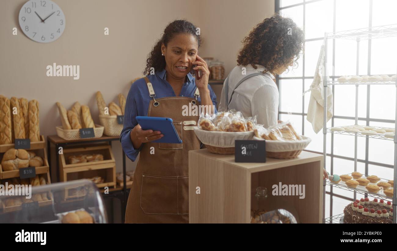 Women workers smiling in bakery hi-res stock photography and images - Alamy