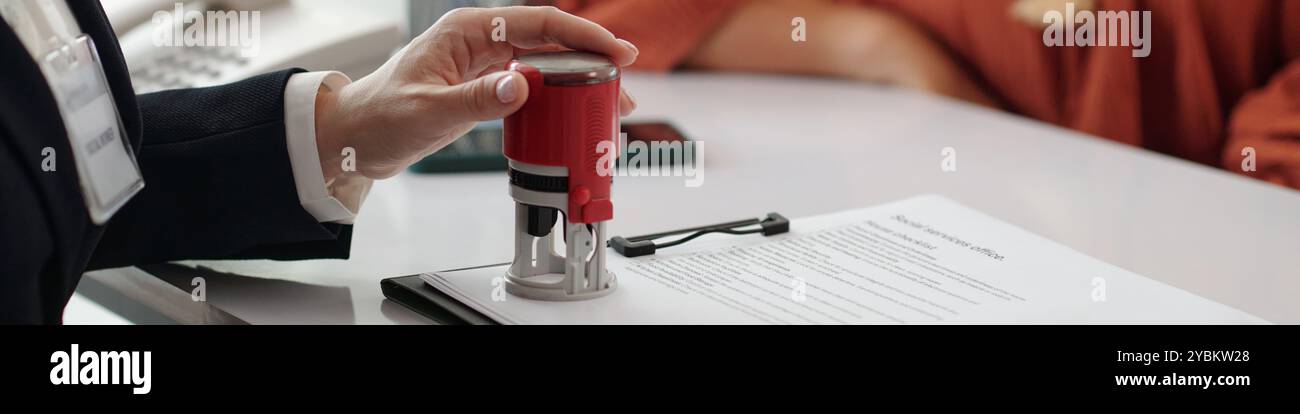 Social Worker Putting Stamp In Contract Stock Photo - Alamy