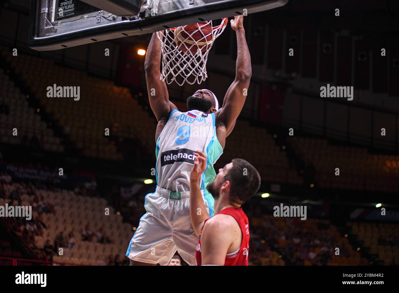 Josh Nebo (Slovenia) dunking over Ivica Zubac (Croatia). FIBA Olympic ...