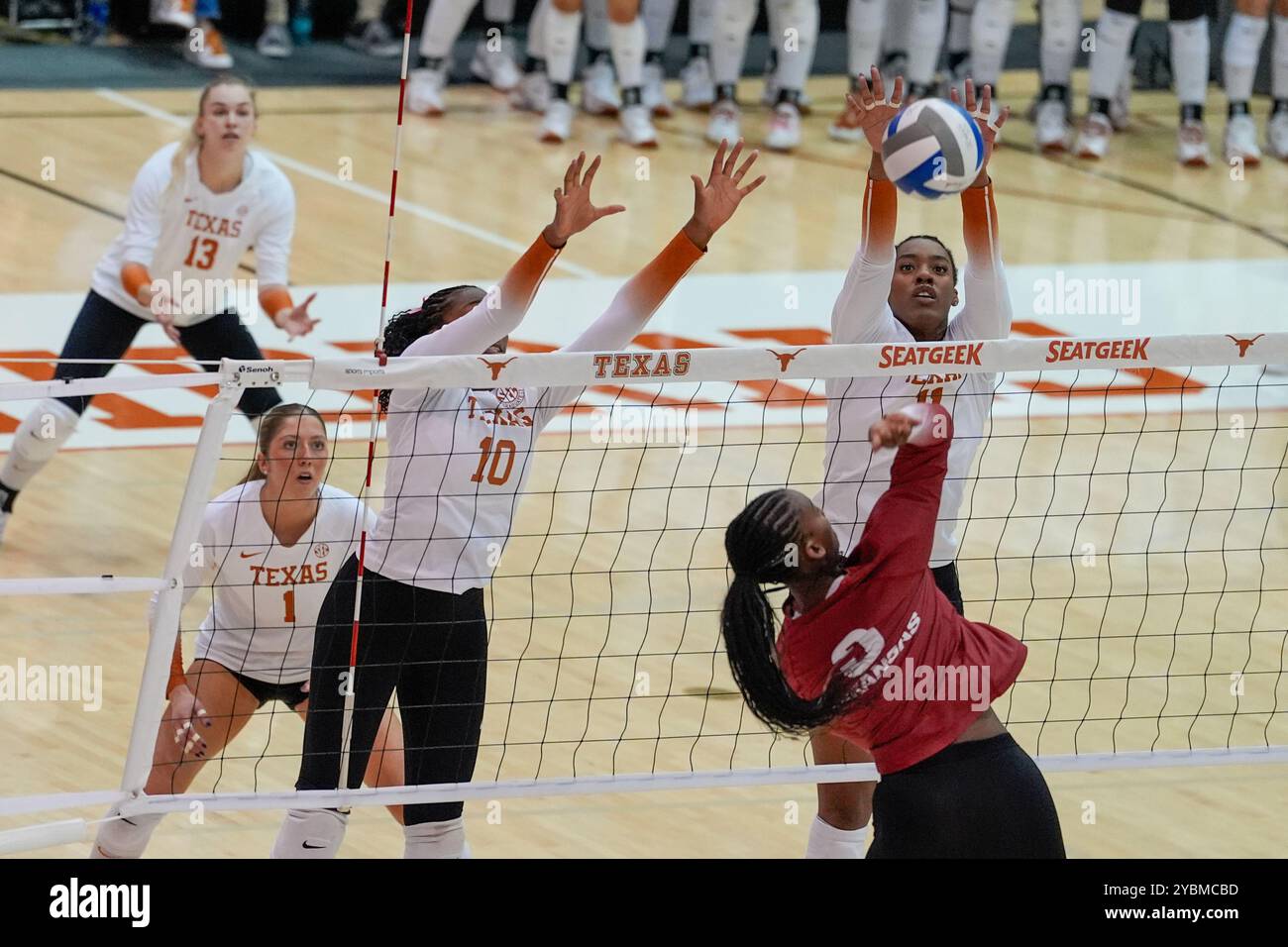 Texas opposite hitter Reagan Rutherford (10) and middle blocker ...
