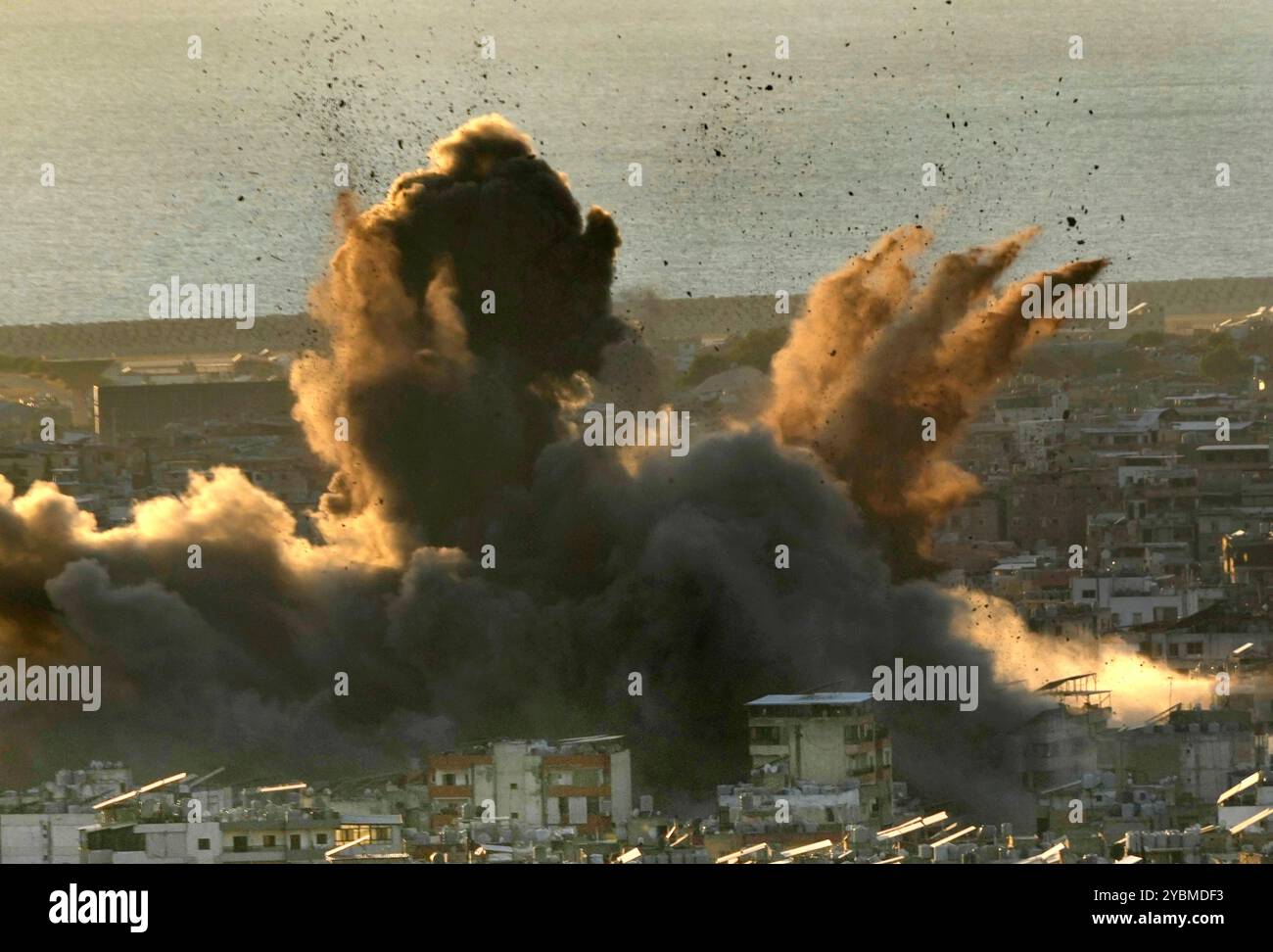 Smoke rises from Israeli airstrikes on Dahiyeh, in the southern suburb ...