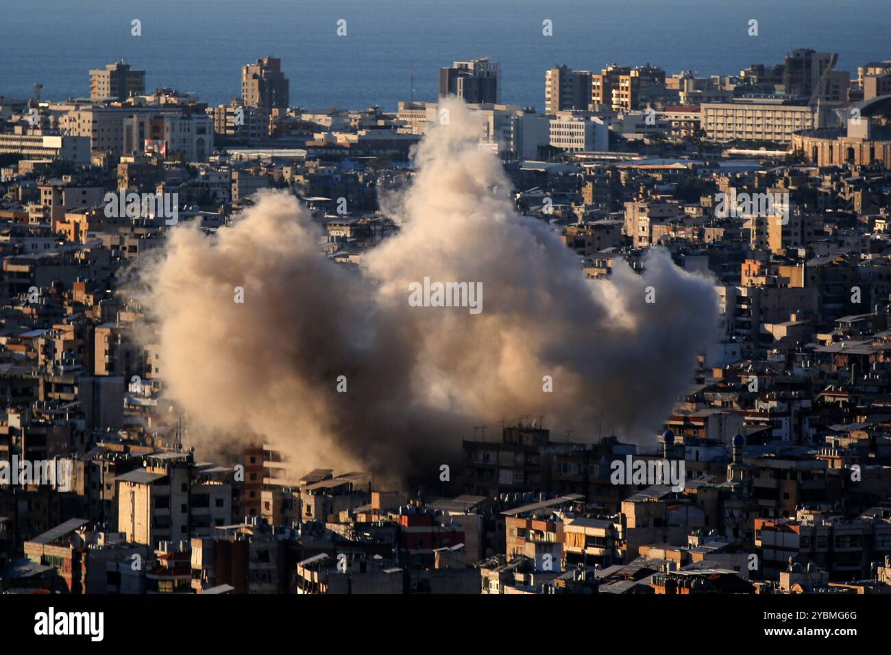 Beirut, Lebanon. 19th Oct, 2024. Smoke billows form Beirut southern ...