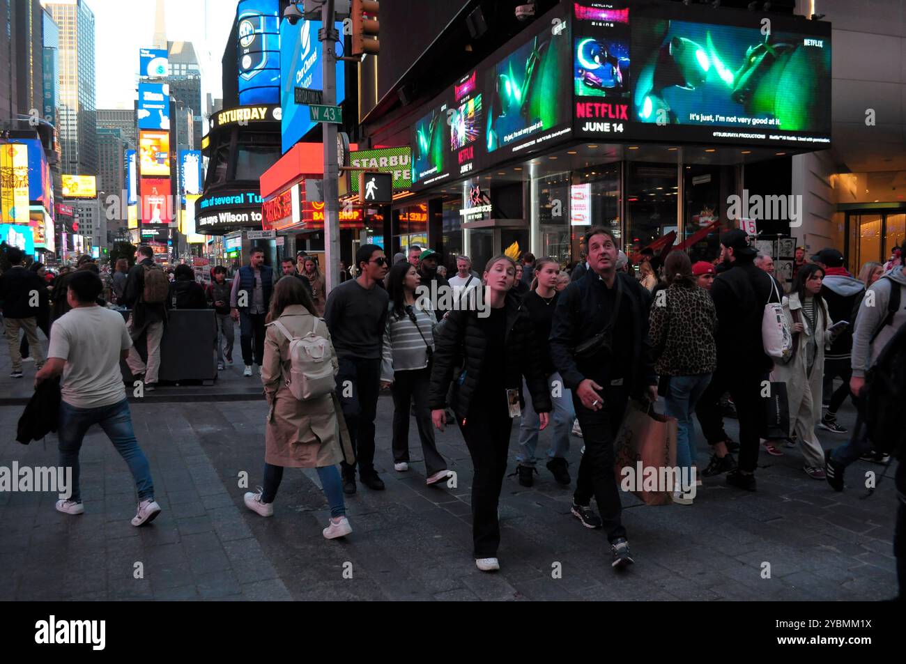 People walk through Times Square, Manhattan, New York City Stock Photo ...
