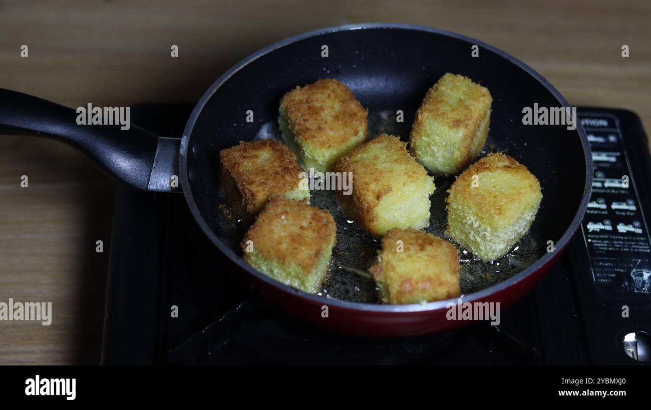 Bite sized golden brown hi-res stock photography and images - Alamy